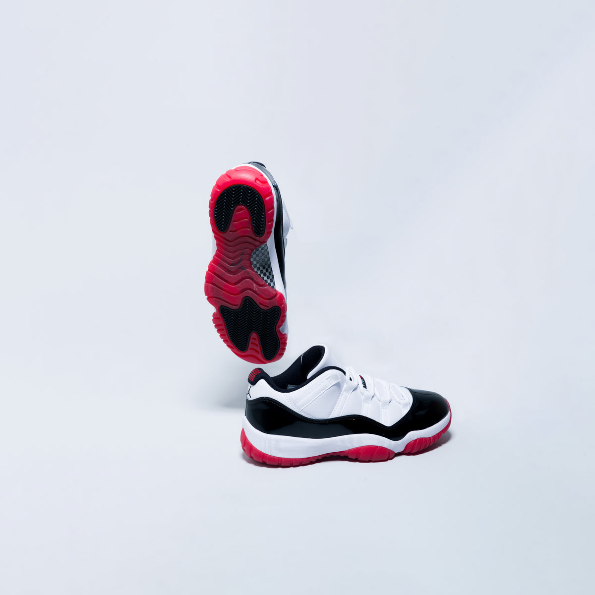 Nike Air Jordan 11 Low 'University Red' | UP THERE